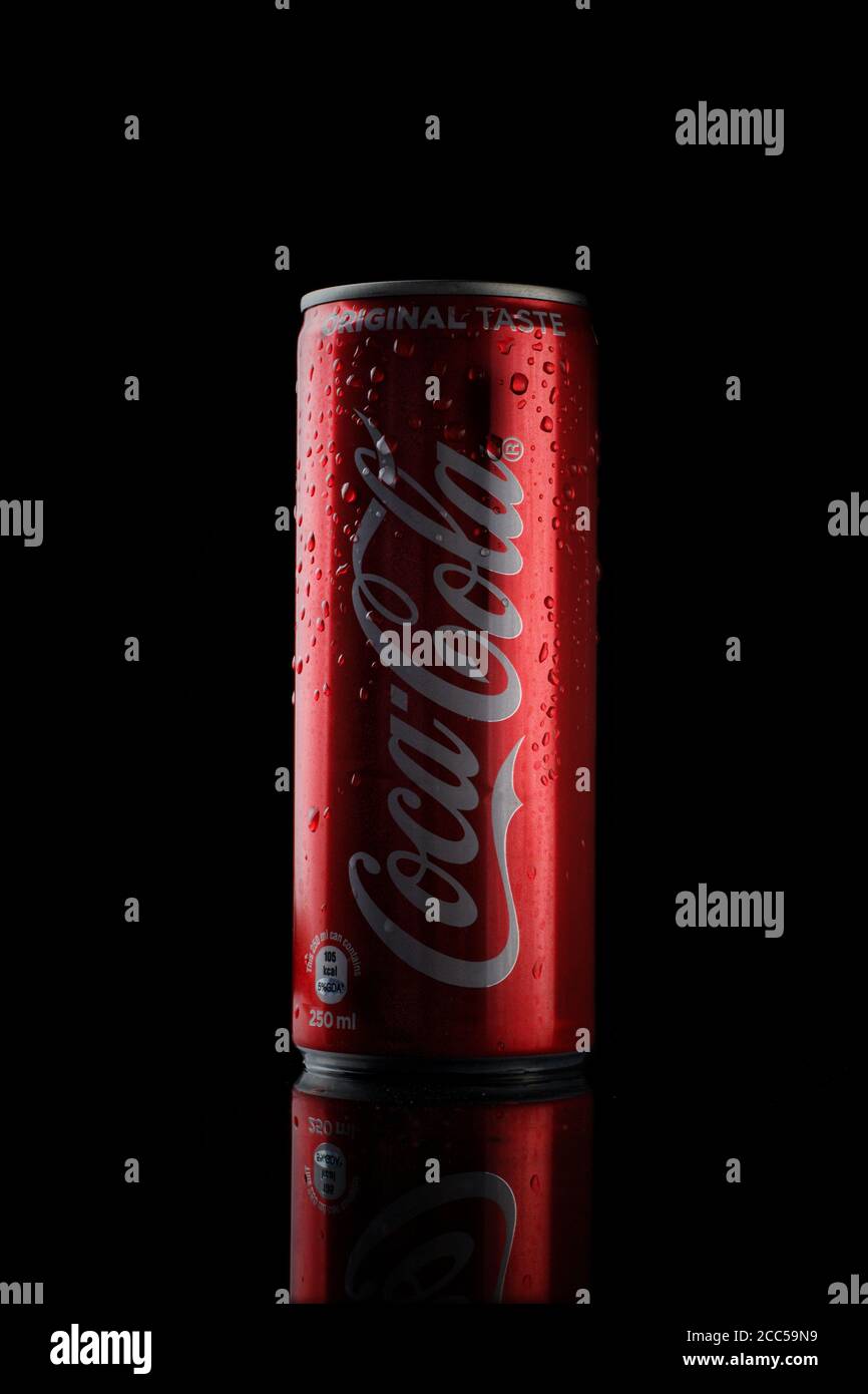 Fresh & cool coca cola can on black background Stock Photo - Alamy