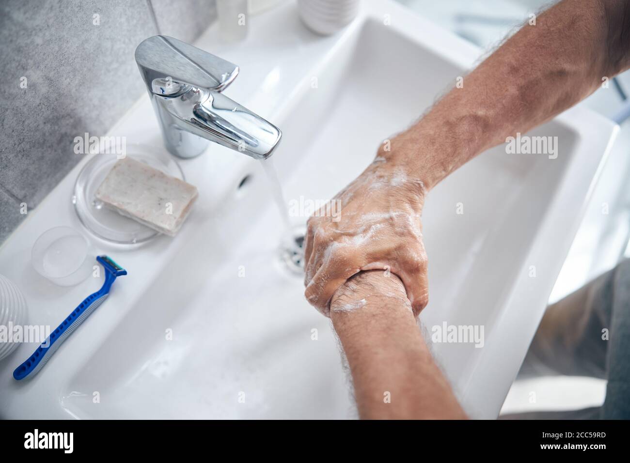 Handwashing adult hi-res stock photography and images - Alamy