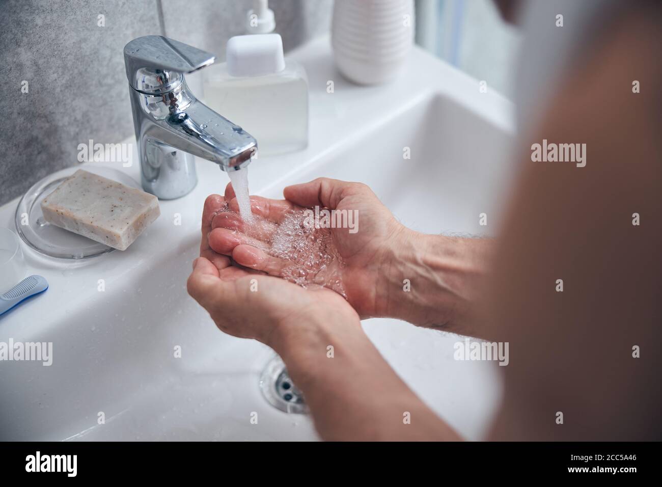 Cropped hands man cleaning hi-res stock photography and images - Alamy