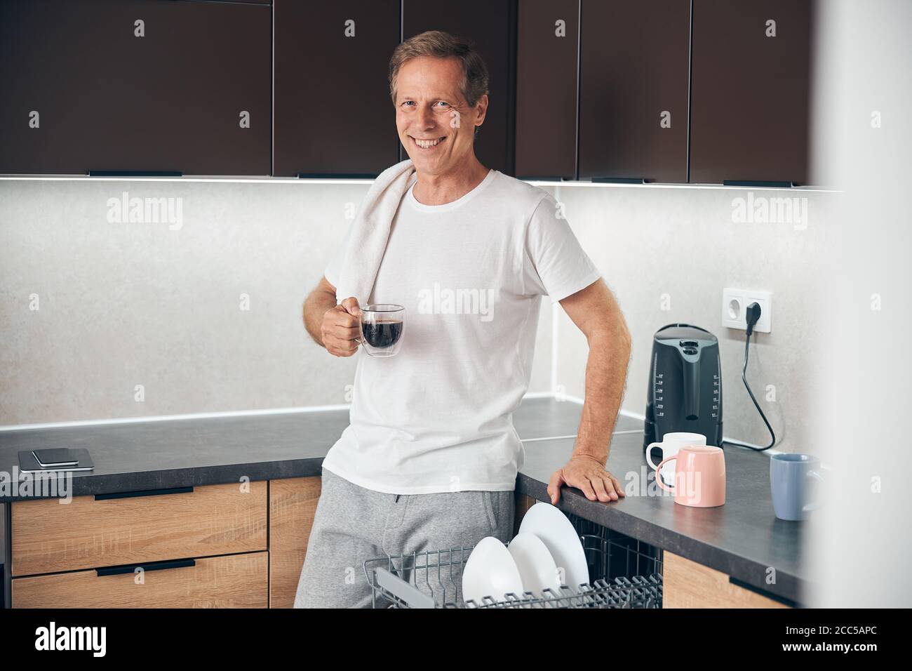 Happy handsome male person looking straight at camera Stock Photo - Alamy