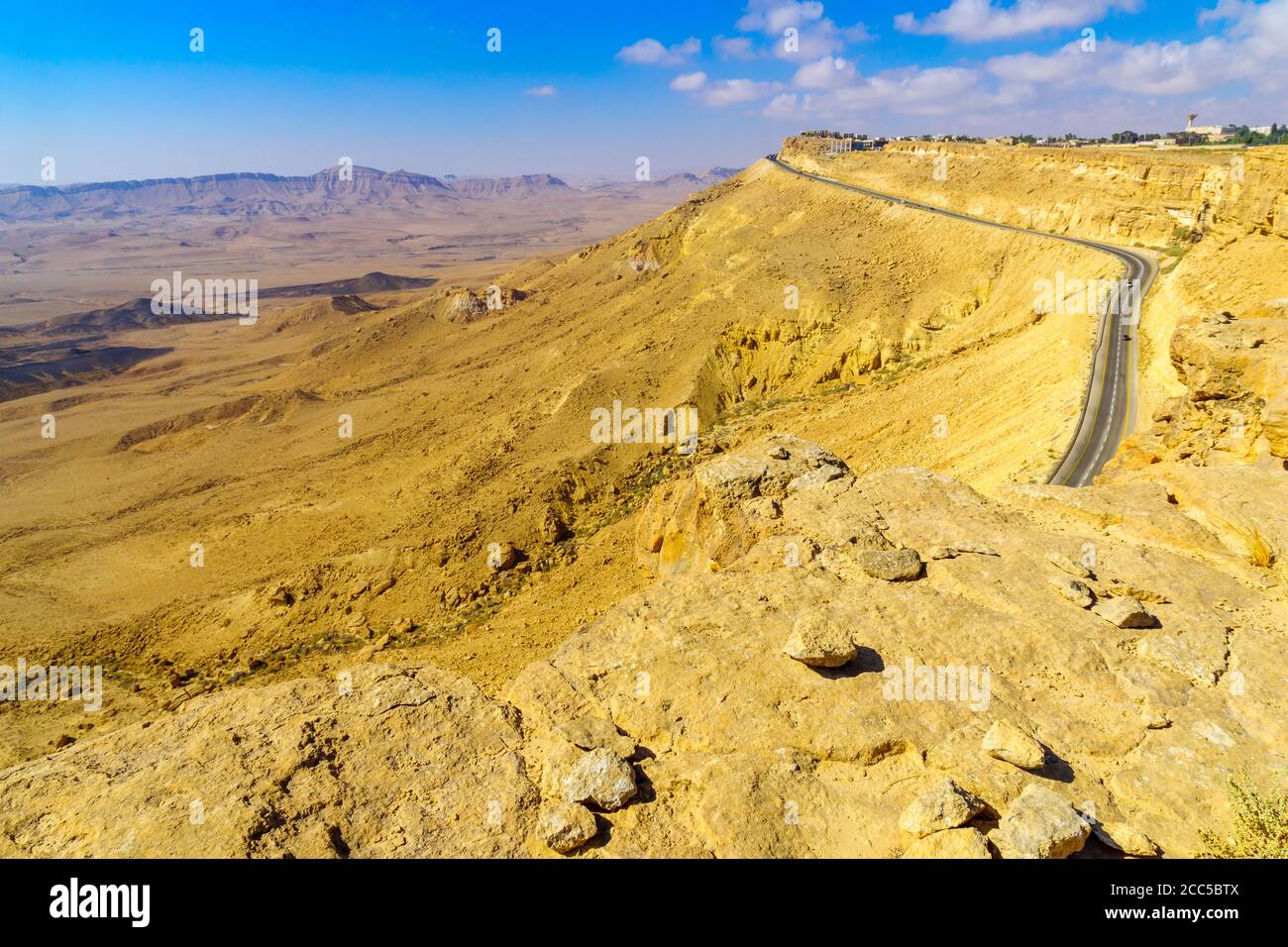 View of cliffs, landscape, and road in Makhtesh (crater) Ramon, the ...