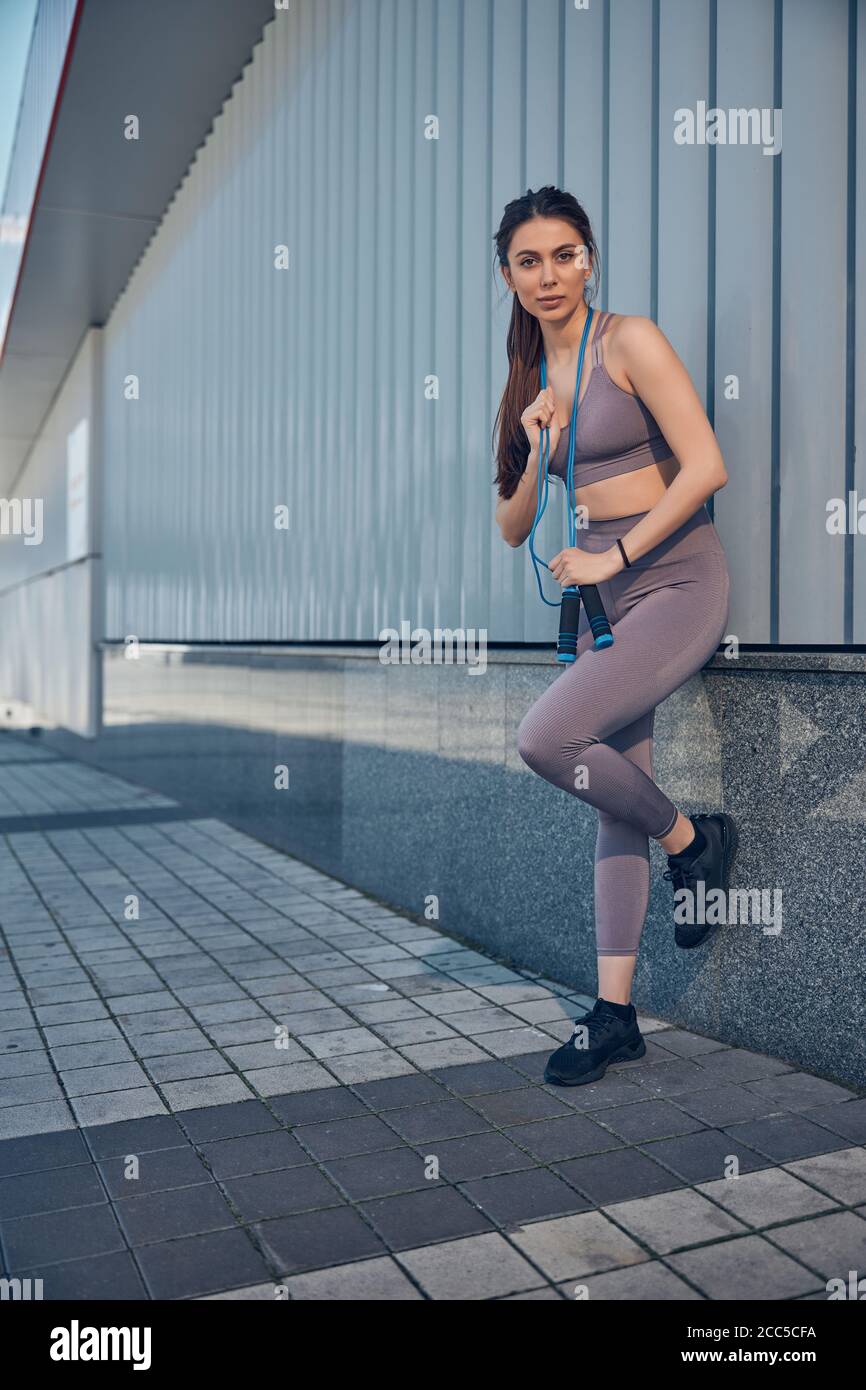 Relaxed pretty lady standing hi-res stock photography and images - Alamy