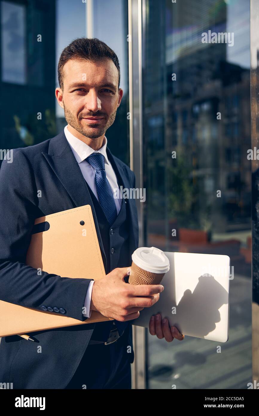 Stylish Caucasian male staying alone near building Stock Photo - Alamy