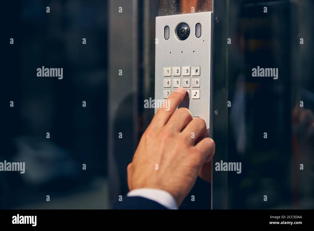 Businessman entering office building hi-res stock photography and ...