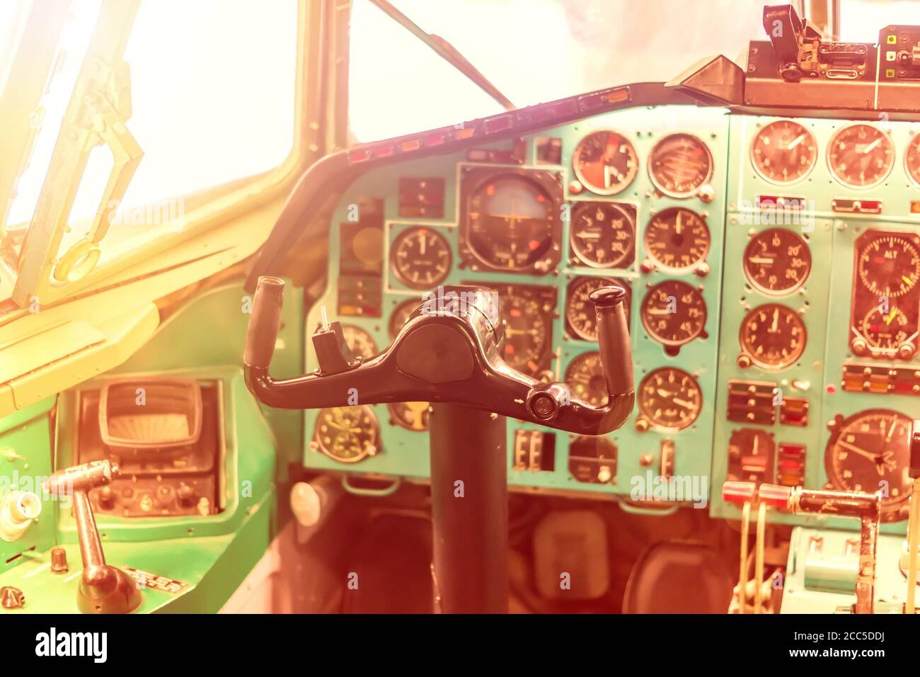 pilot seat in the old plane. Steering wheel and control panel in the ...