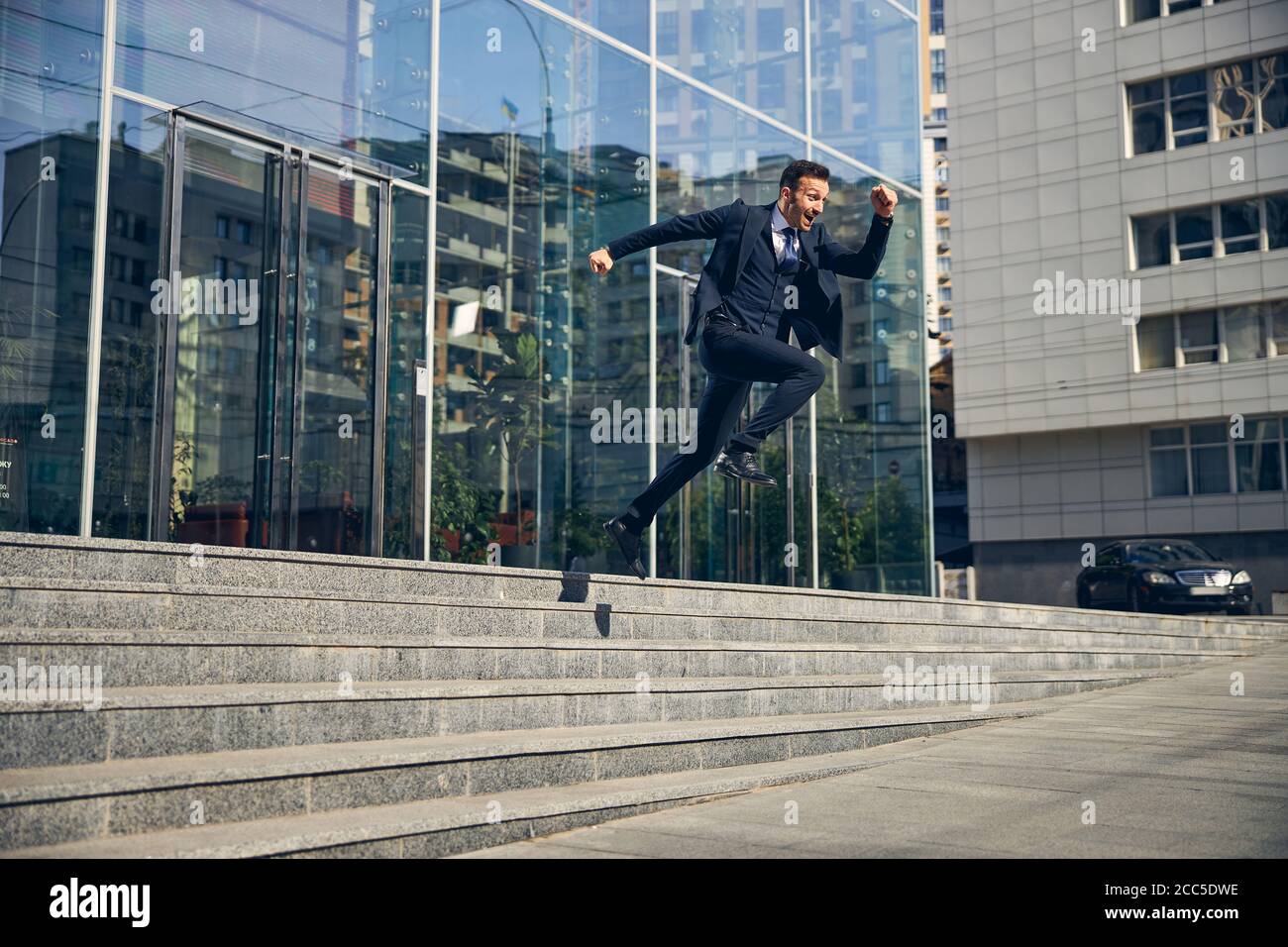 Jumping down stairs hi-res stock photography and images - Alamy