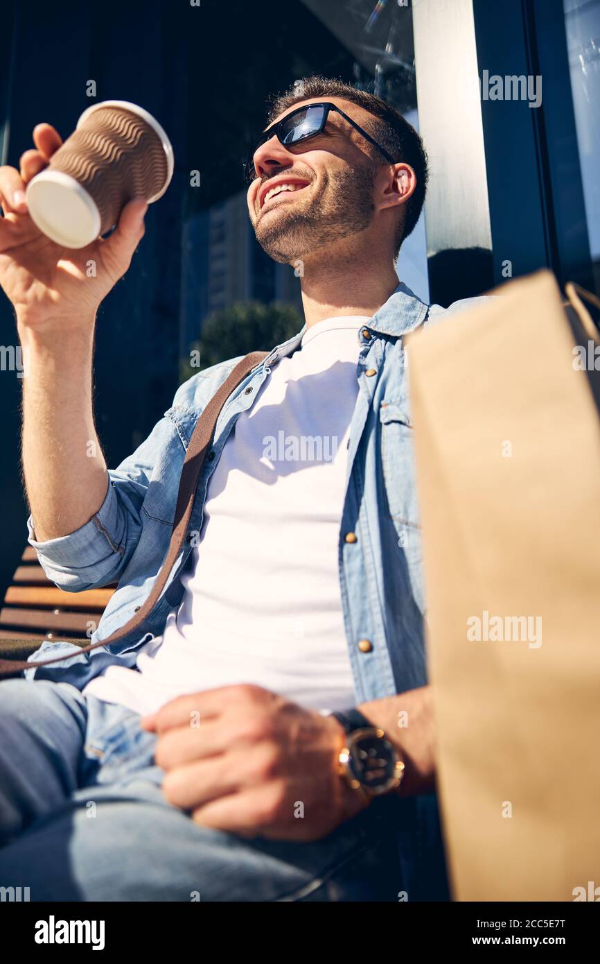 Positive delighted male person demonstrating his smile Stock Photo - Alamy