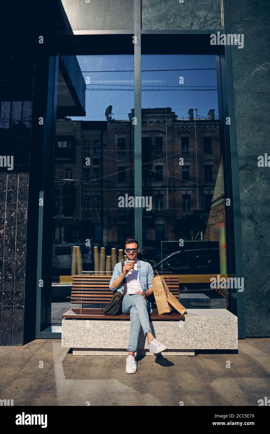 Cheerful male person looking straight at camera Stock Photo - Alamy