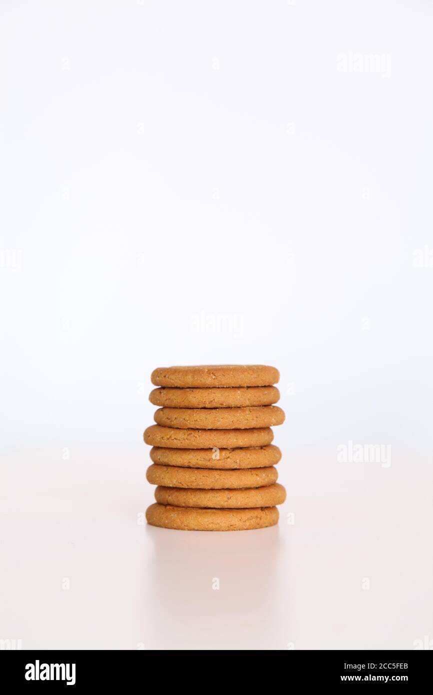McVitie's Ginger Nuts stack of biscuits in a pile isolated on white ...
