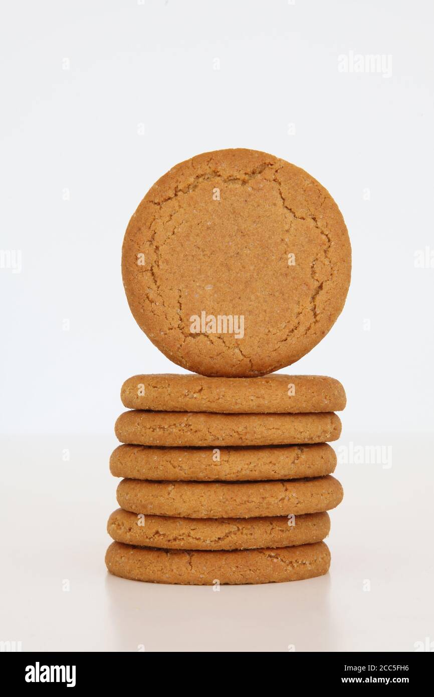 McVitie's Ginger Nuts stack of biscuits in a pile isolated on white ...
