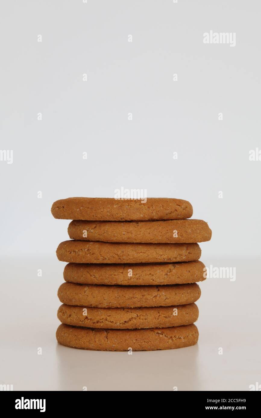 McVitie's Ginger Nuts stack of biscuits in a pile isolated on white ...