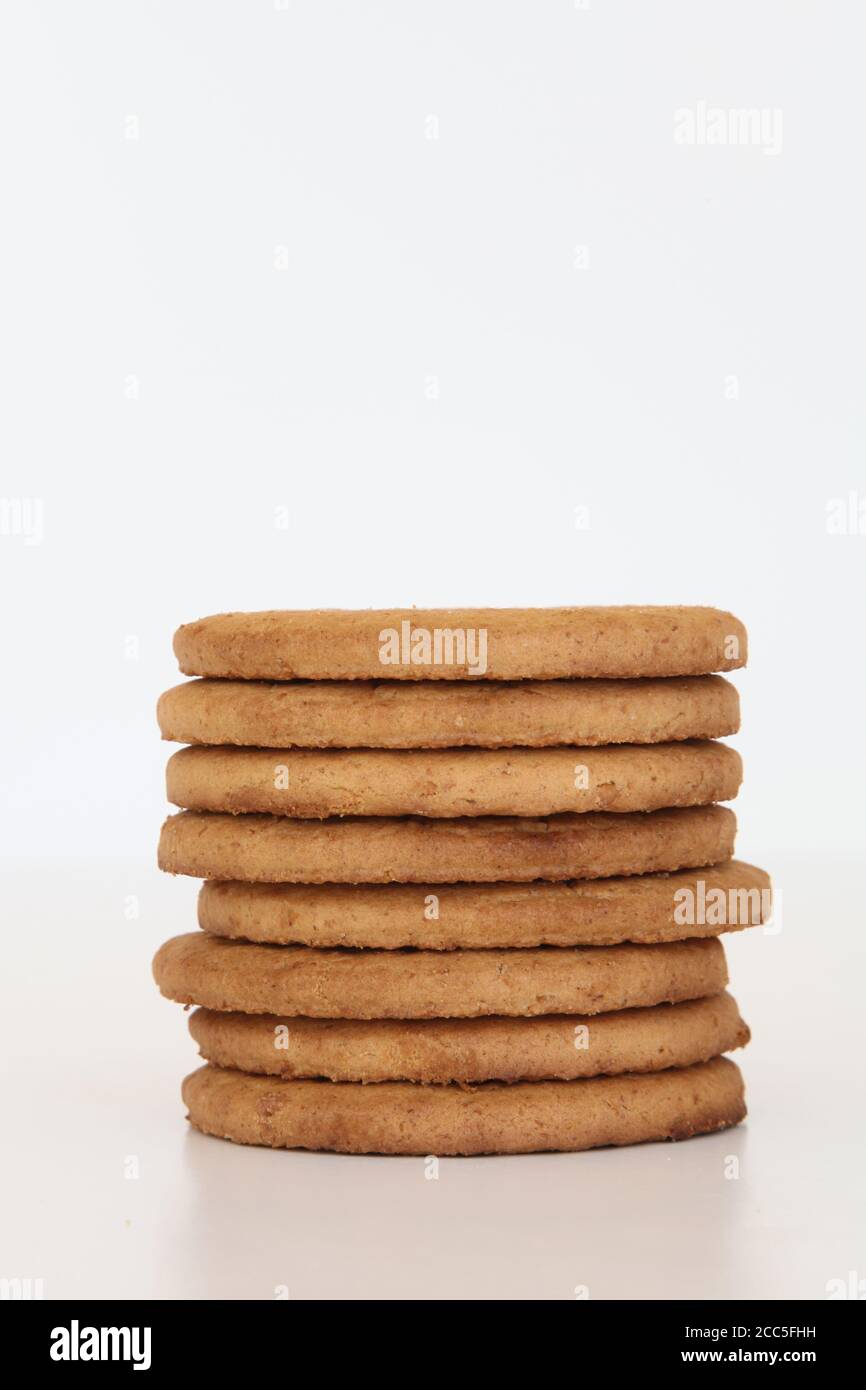 Generic Sweetmeal Digestive biscuits stacked in a pile isolated on ...