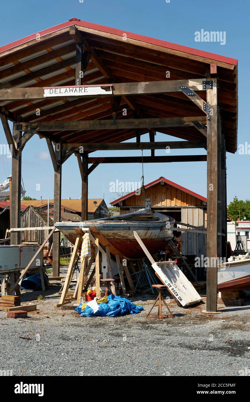 Wooden working boats are reconstructed in the boatyard of the ...