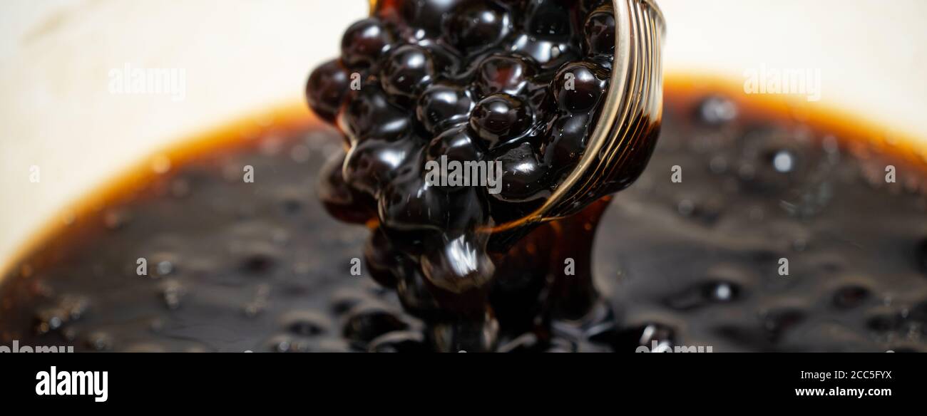 Cooking, boiling brown sugar flavor tapioca pearl balls, ingredient of ...