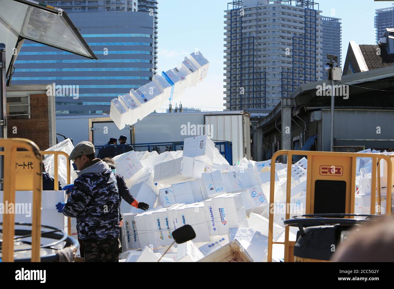 Discarded polystyrene ice boxes in the Tsukiji fish market in Tokyo ...