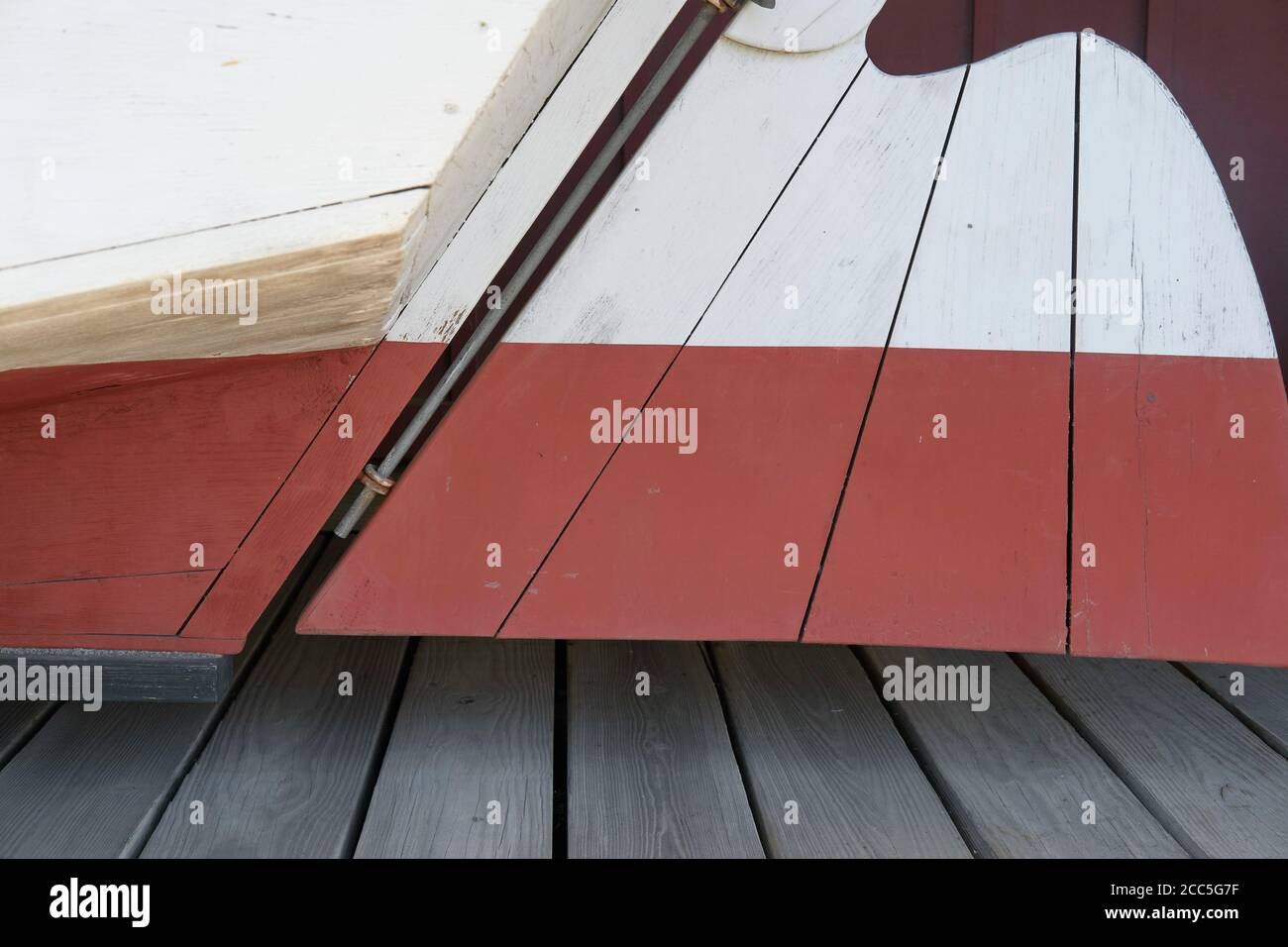 Small boat with red and white rudder on display at the Chesapeake Bay ...