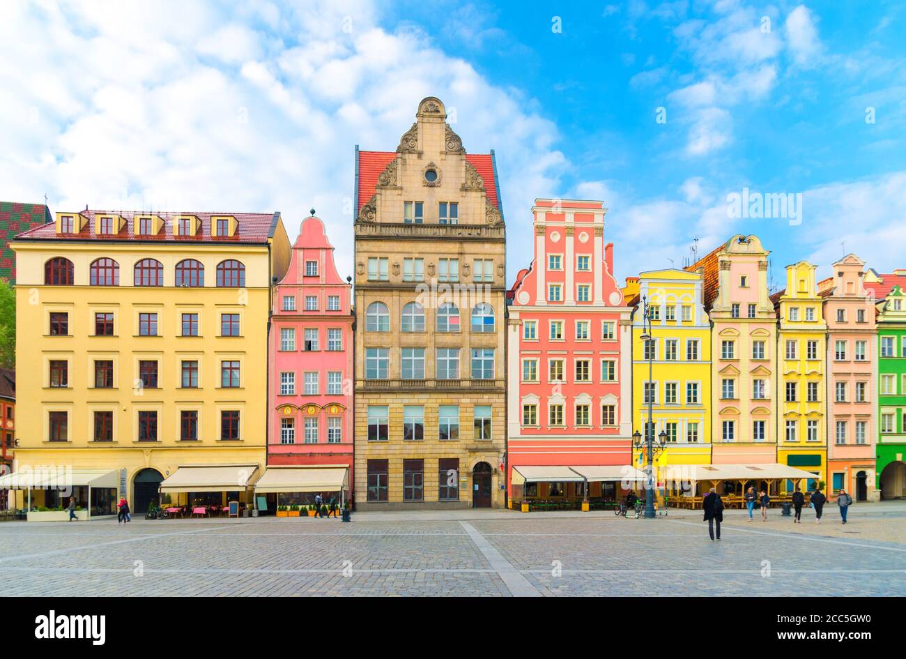 Row of colorful traditional buildings with multicolored facades on ...