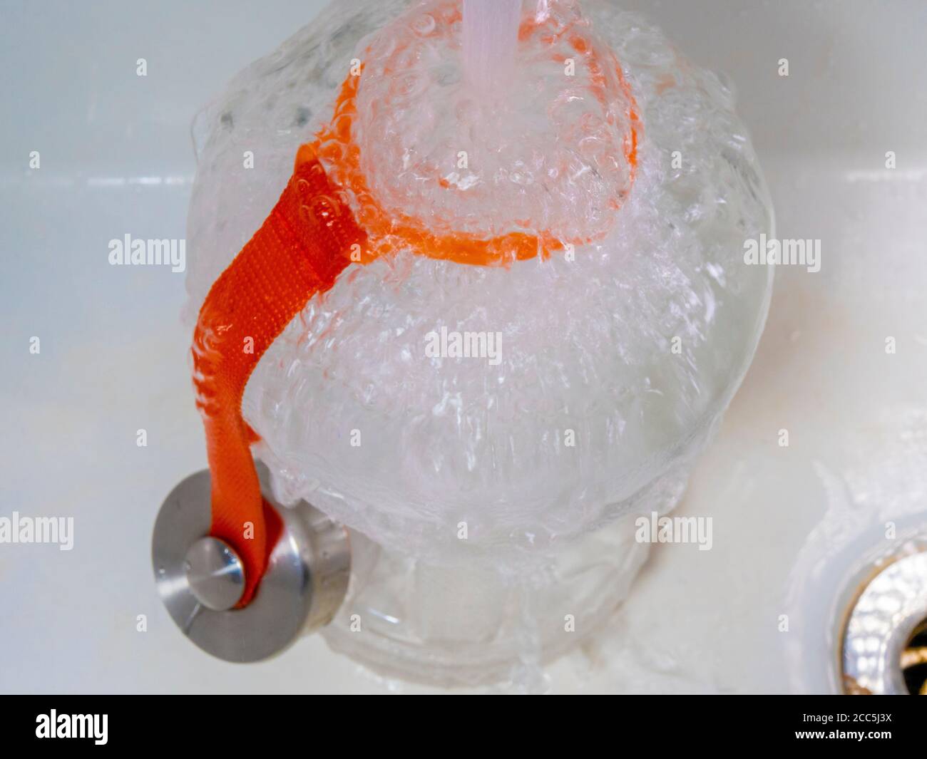 Bottle overflowing with water hi-res stock photography and images - Alamy