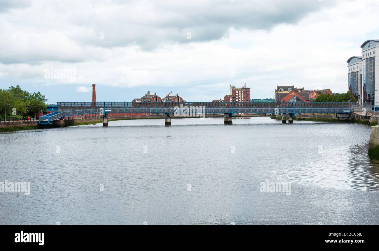 View on the Lagan Railway and Pedestrian Bridge across river Lagan in ...