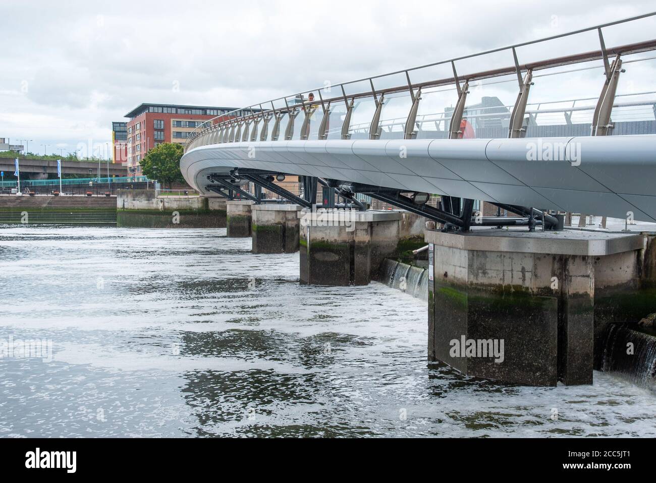 Pedestrian bridge across the River Lagan connects Donegall Quay with ...