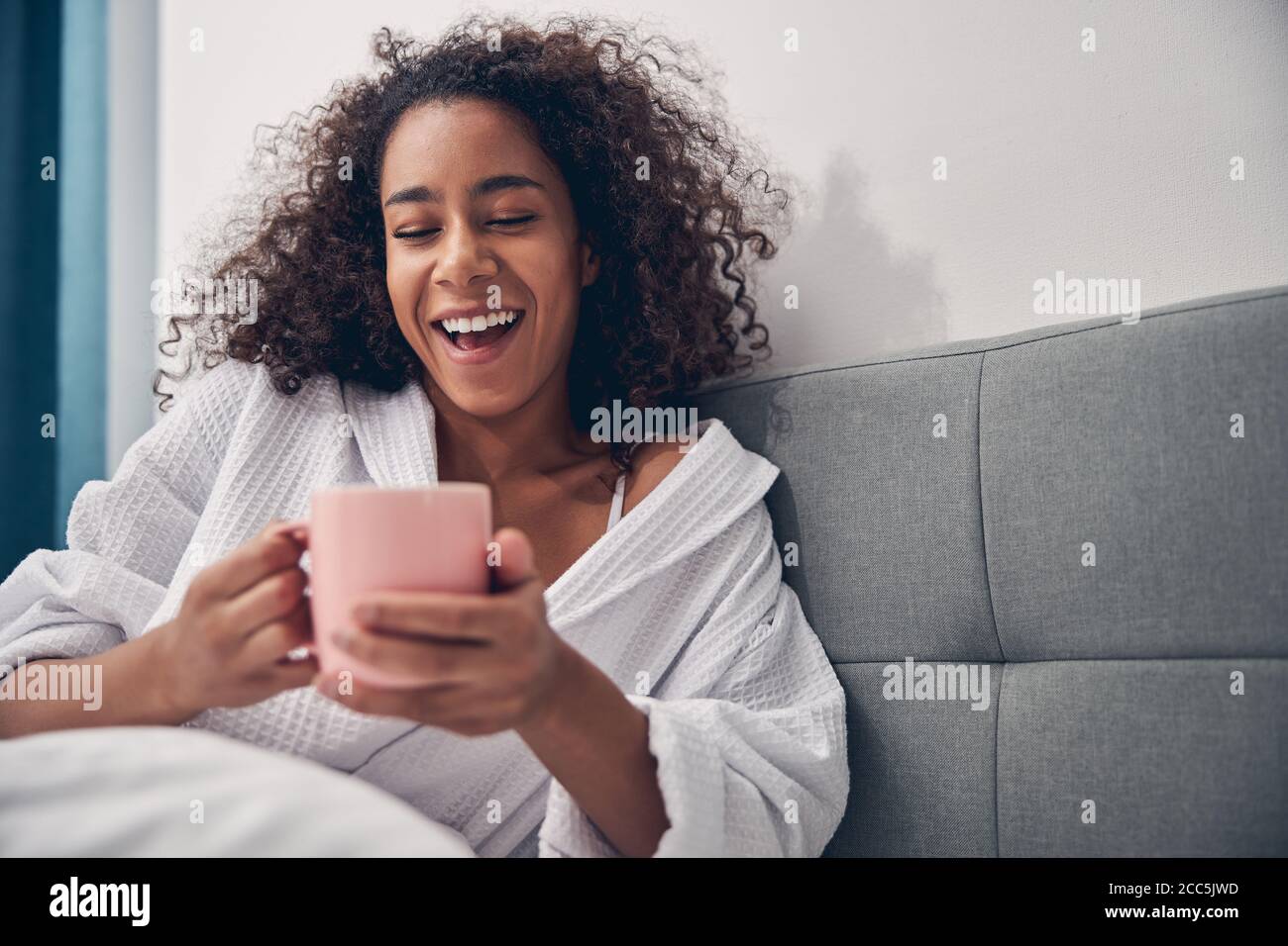 Laughing heartily hi-res stock photography and images - Alamy