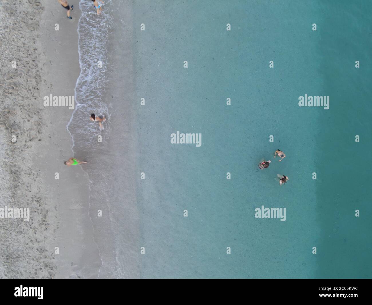 Aerial view of Valtos Beach, Parga, preveza with tourists relaxing on ...