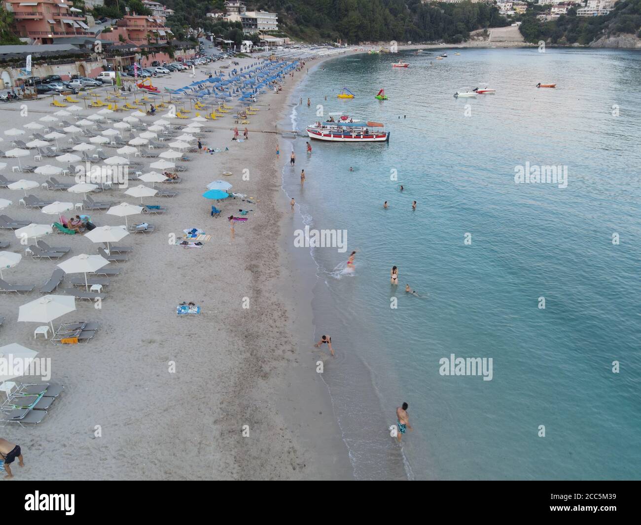 Aerial view of Valtos Beach, Parga, preveza with tourists relaxing on ...