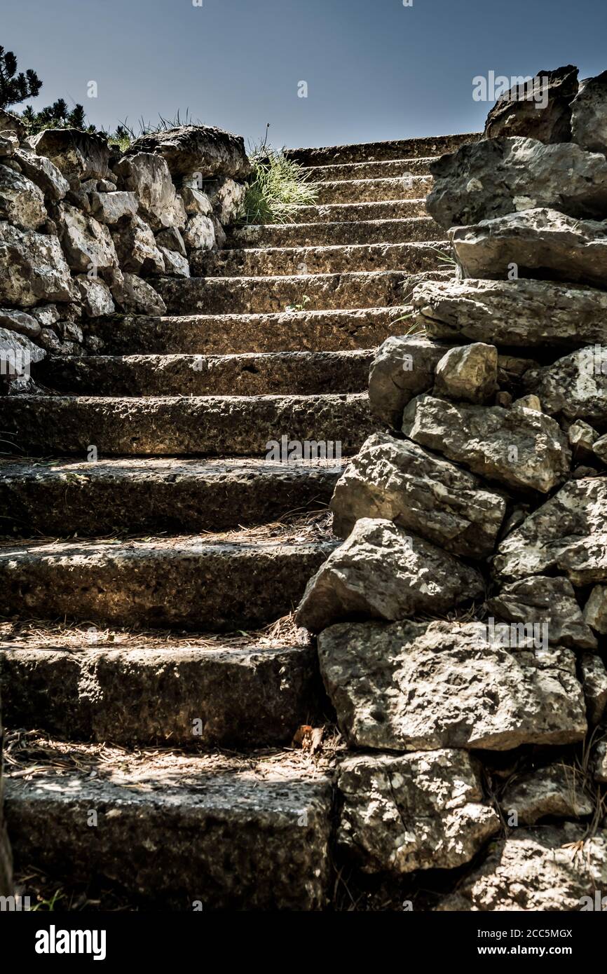 Steep Outdoor Stairs With Rock Steps Toward Blue Sky Stock Photo - Alamy
