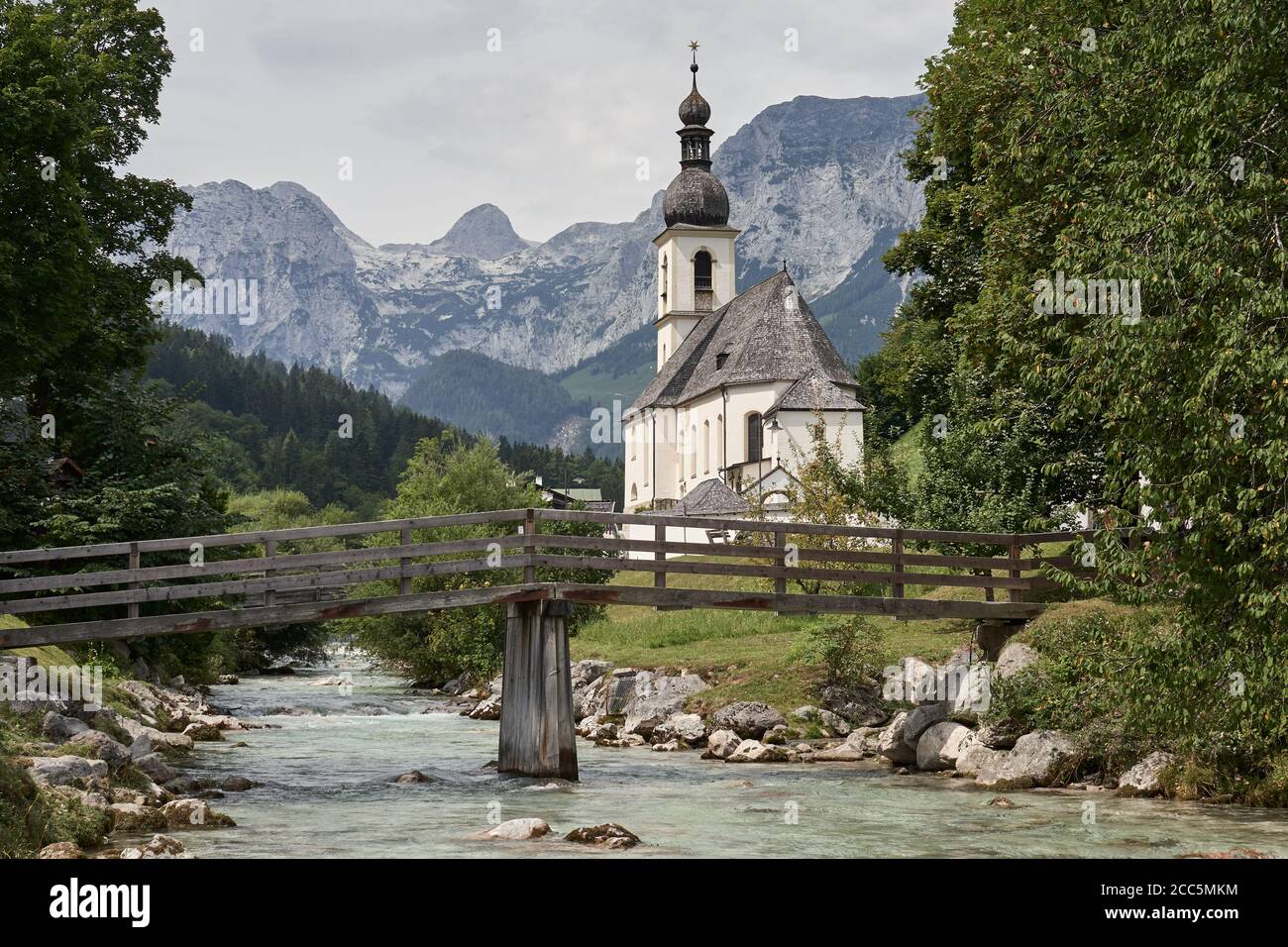 St. Sebastian church next to a mountain creek in Ramsau, Germany Stock ...