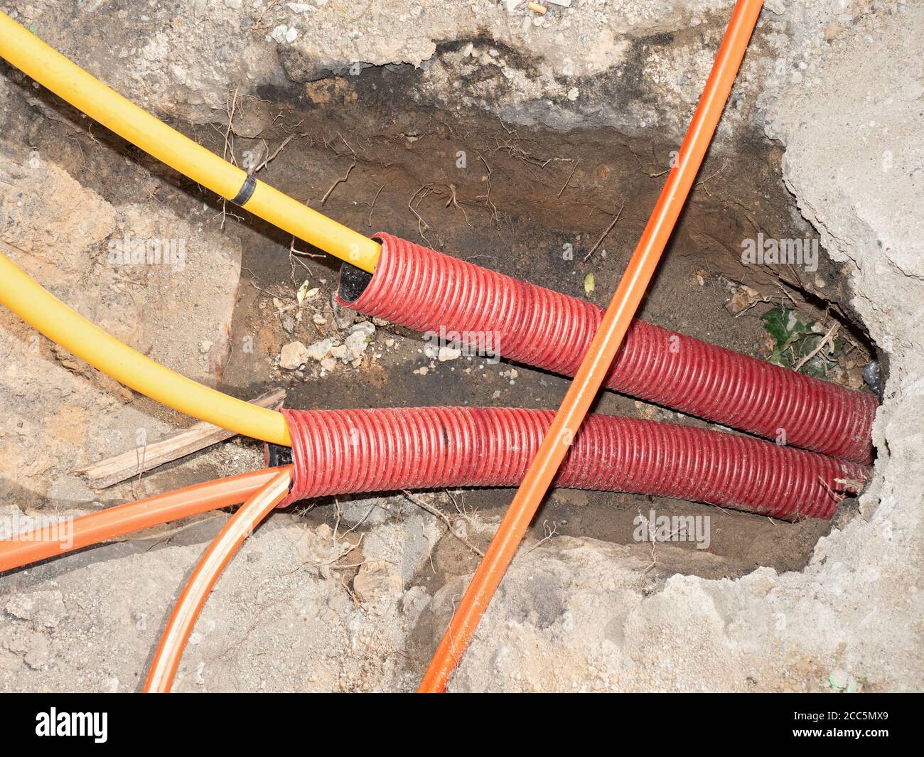 Construction trench with electrical wires. Road work for the ...