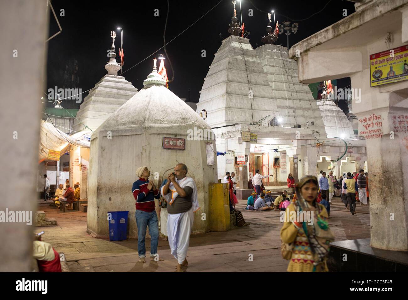 Devotees pray at Baidyanath Temple, dedicated to the God Shiva, in Deoghar, India. City of ...