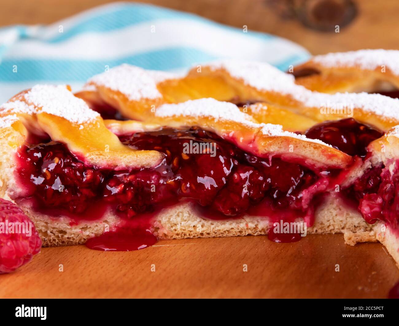 Yummy freshly piece of cake pie with raspberries, close up Stock Photo ...