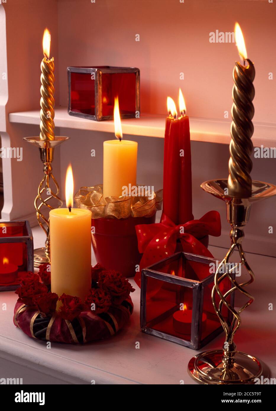 Assorted sizes of candles and containers grouped together Stock Photo ...