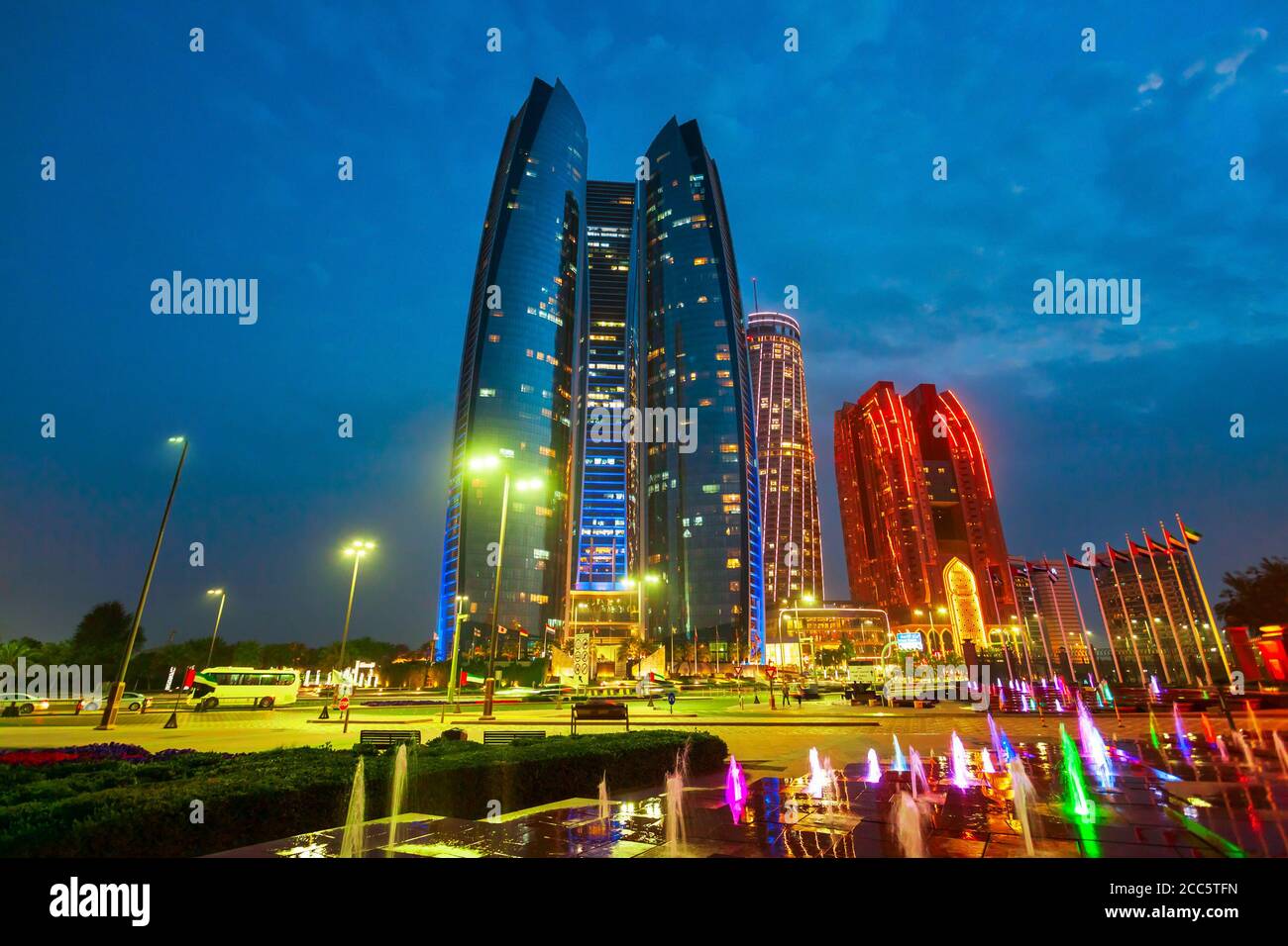Abu Dhabi skyline at sunset. Abu Dhabi is the capital and the second ...