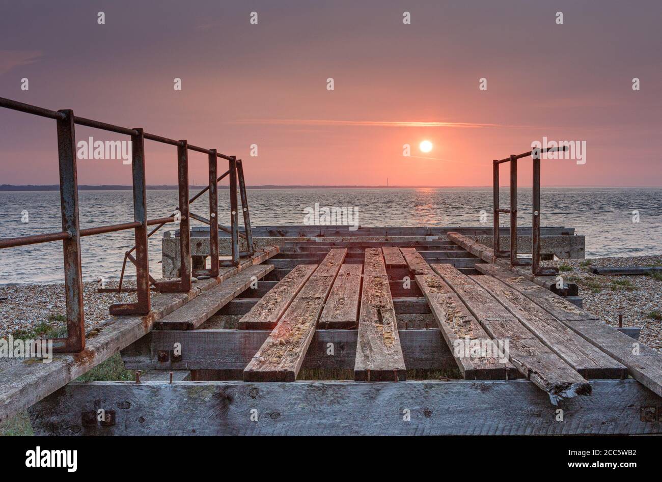 A dilapidated old pier at the end of Hurst Spit, next to Hurst Castle ...