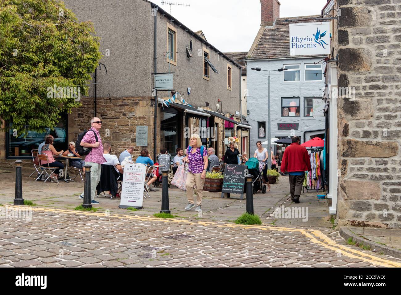 View of unidentified people enjoying the shops on Victoria Street ...