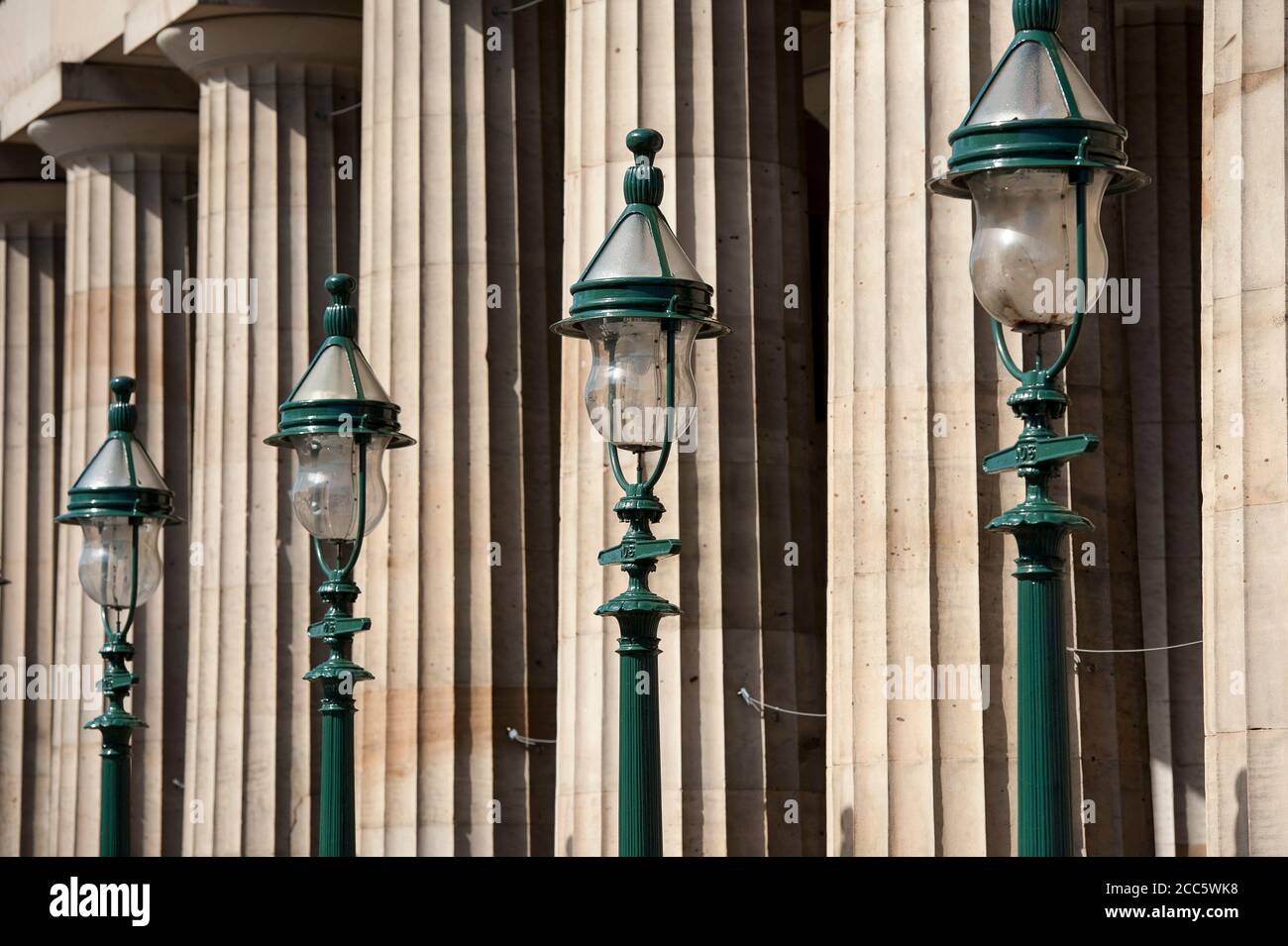 Colonnade and street lighting in a street in Edinburgh city centre ...