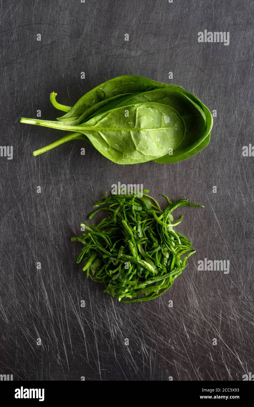 Baby Spinach, whole & cut Stock Photo - Alamy