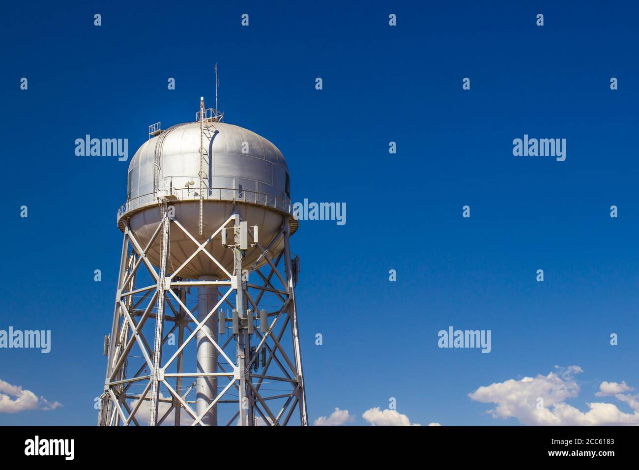 Metal Water Tank Tower With Communication Antennas Attached Stock Photo ...