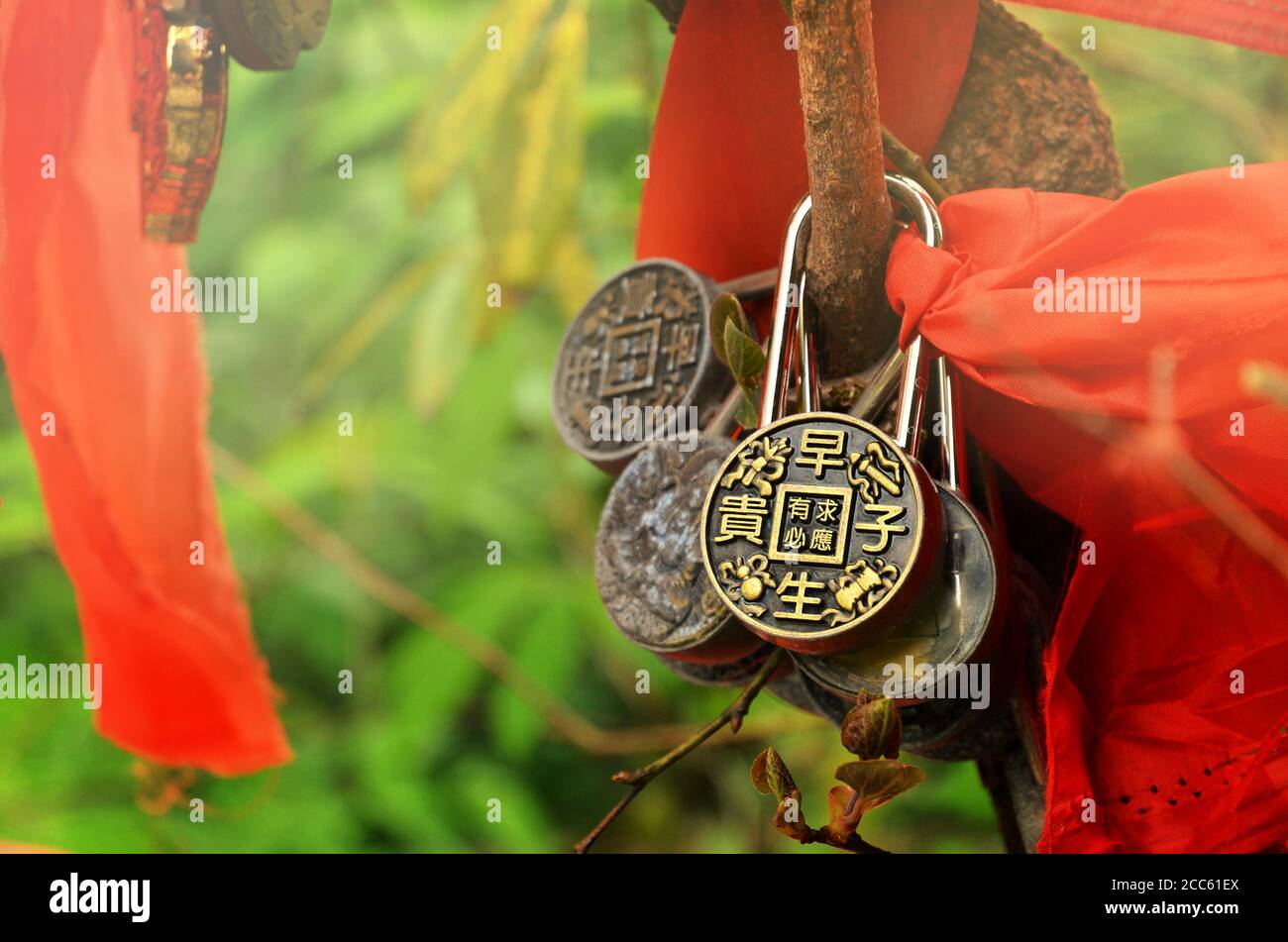 Zhangjiajie, China - May 10, 2017: Detail of love locks with red ...