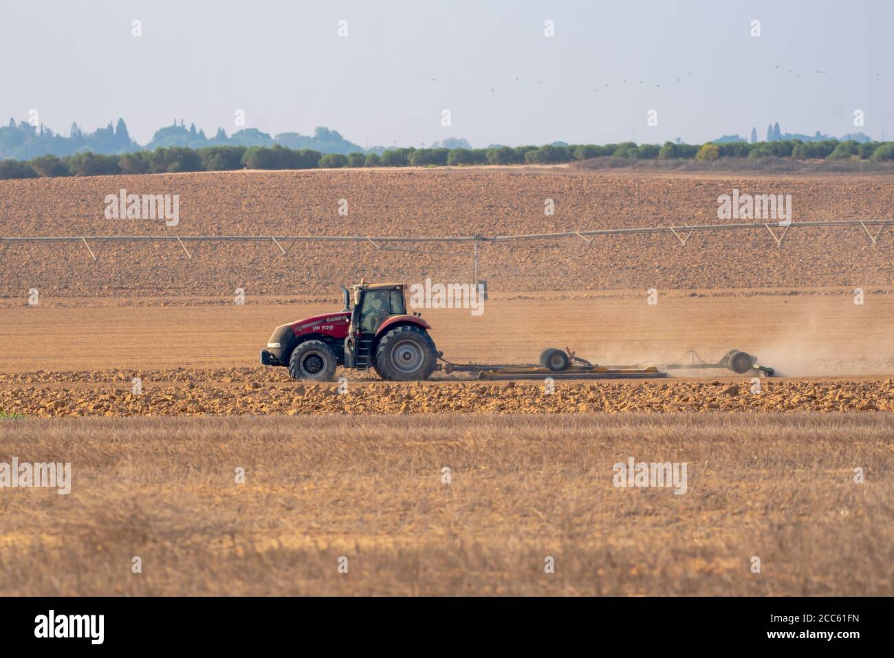 Tractor ploughing a field in the Negev Desert, Israel Photographed at ...