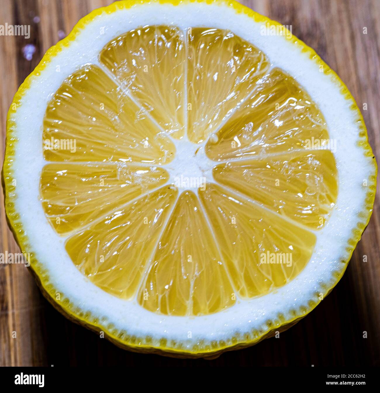 Lemon slice floating in drink Stock Photo - Alamy