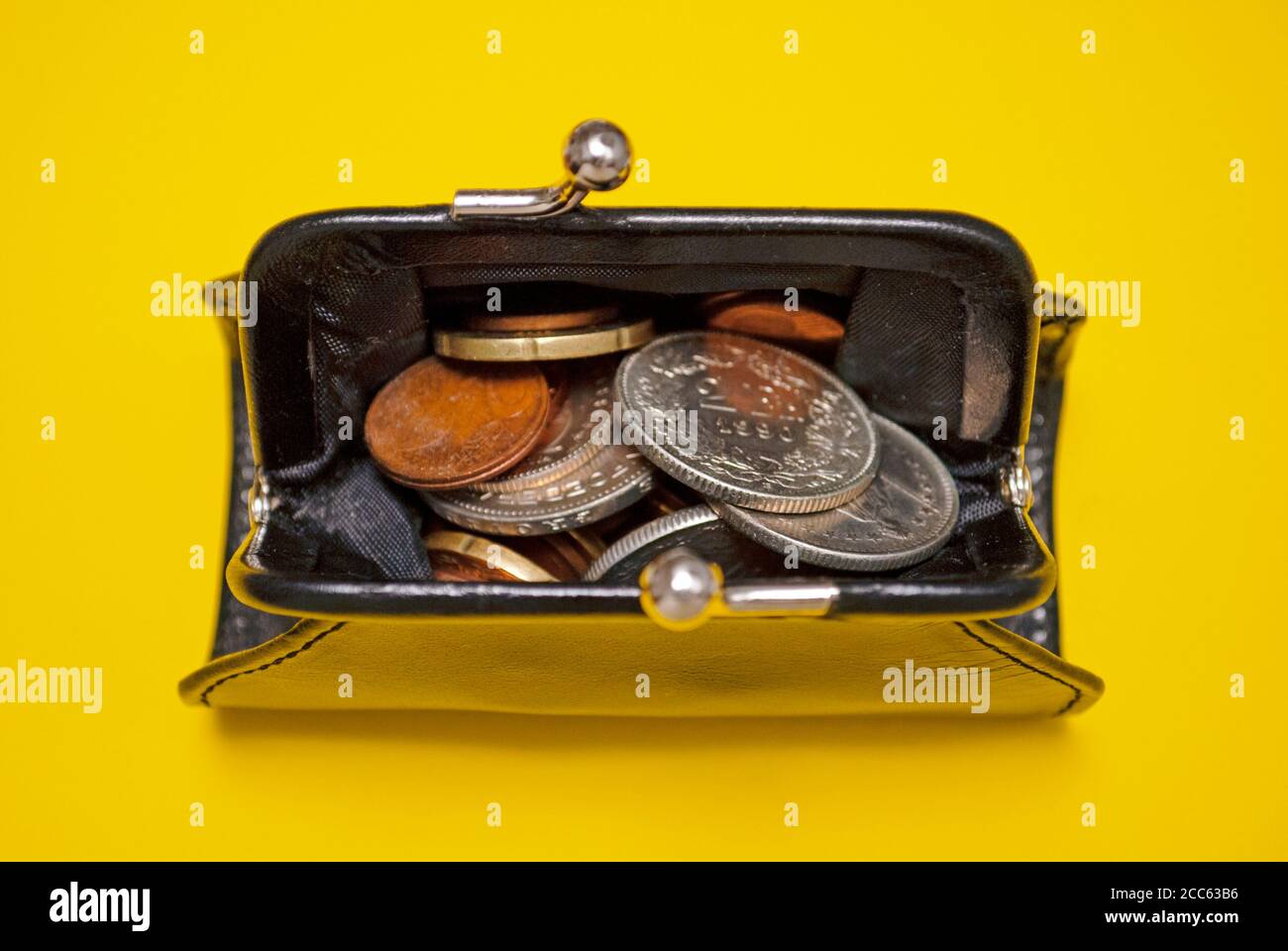 Open purse coins hi-res stock photography and images - Alamy