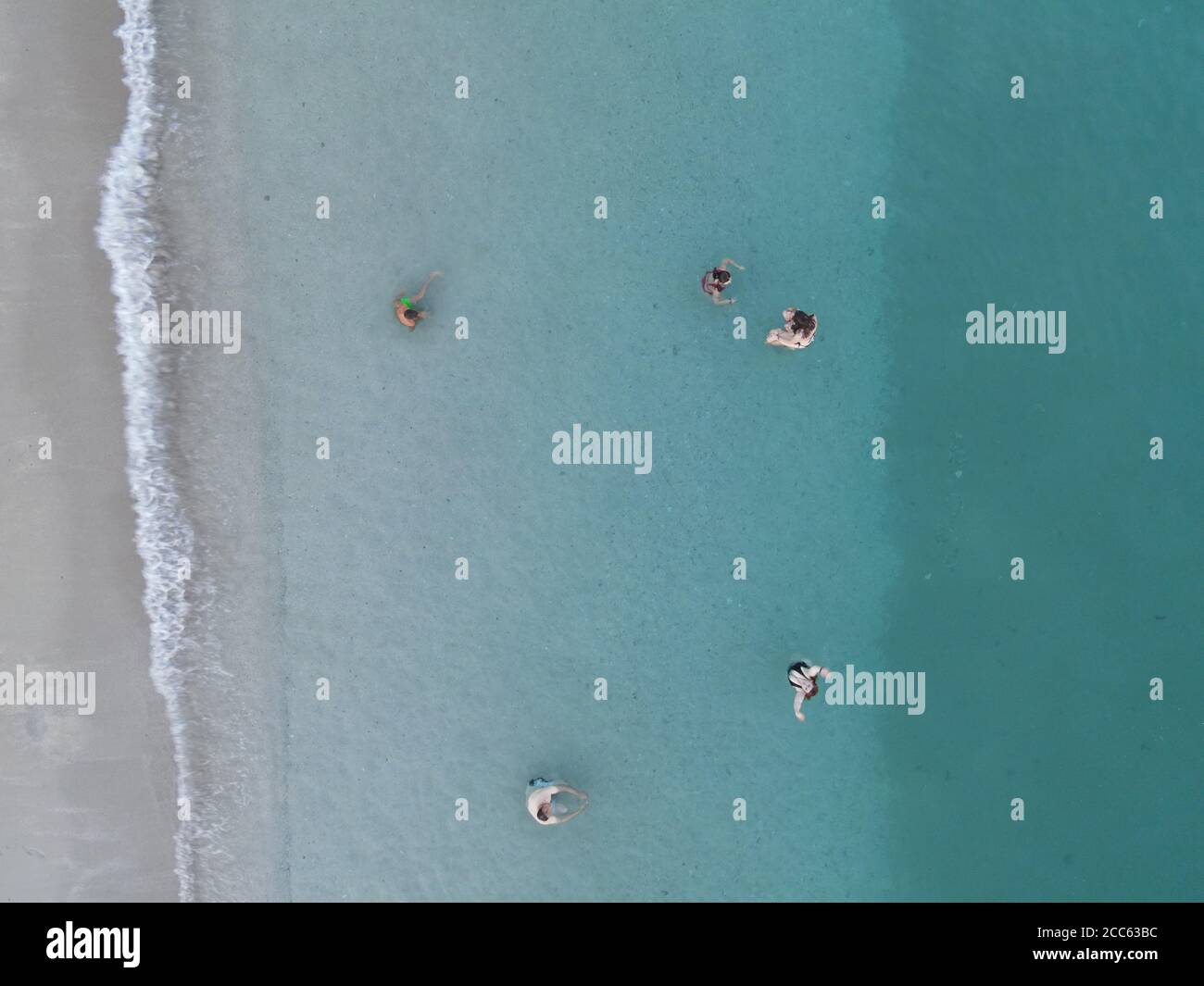 Aerial view of Valtos Beach, Parga, preveza with tourists relaxing on ...