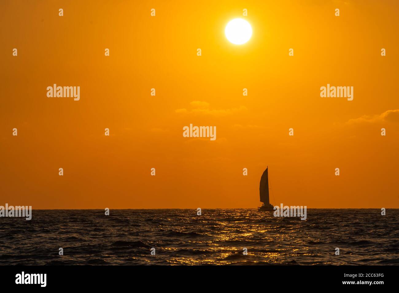 Mediterranean Sun Set, A sail boat crossing the sun at sunset Stock ...