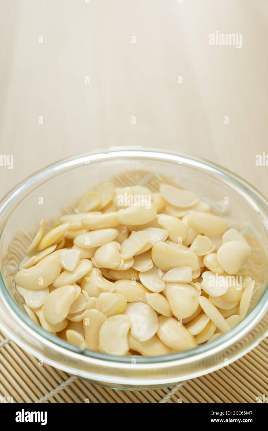 Bowl of white beans without skin Stock Photo - Alamy