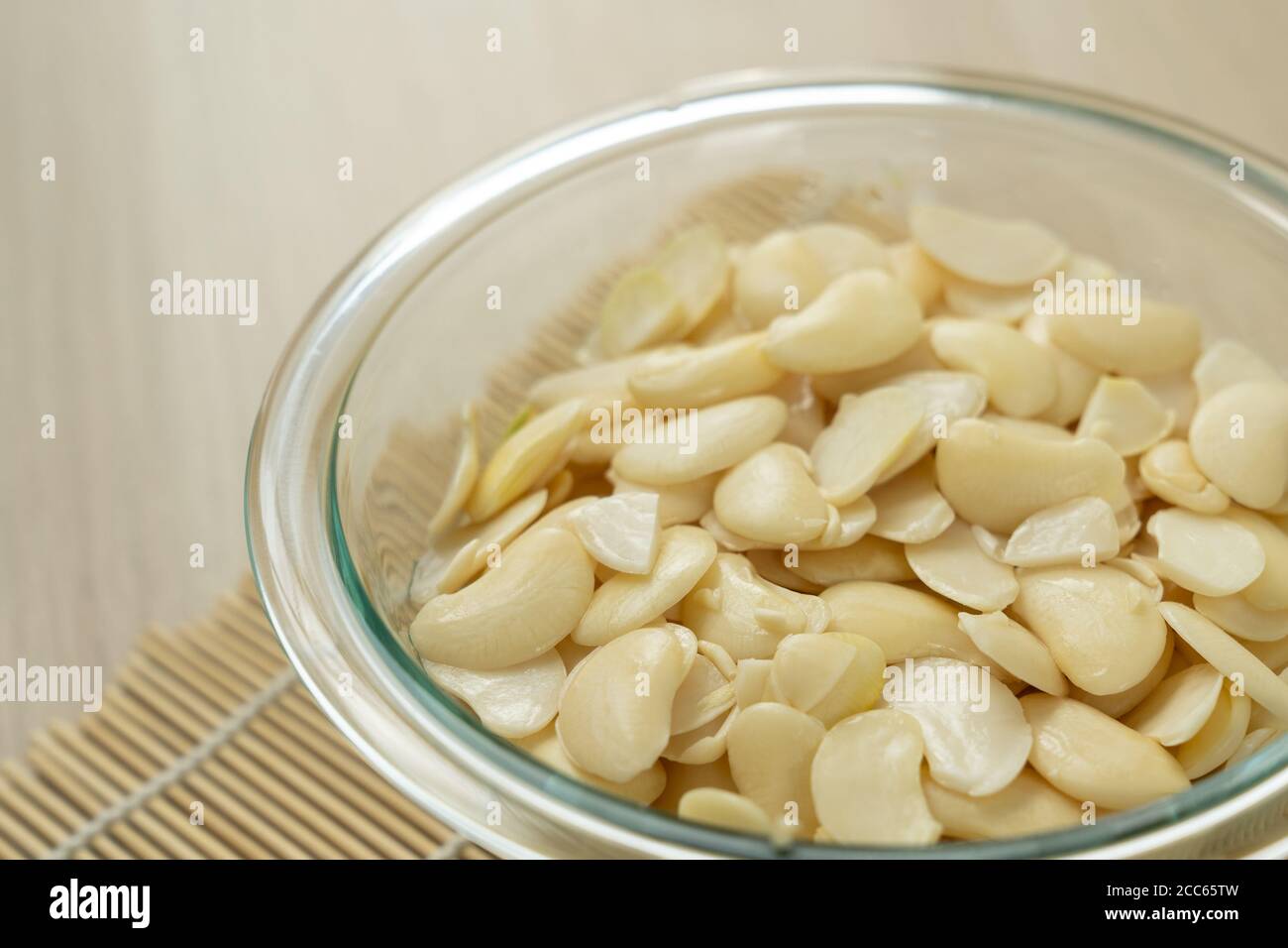 Bowl of white beans without skin Stock Photo - Alamy