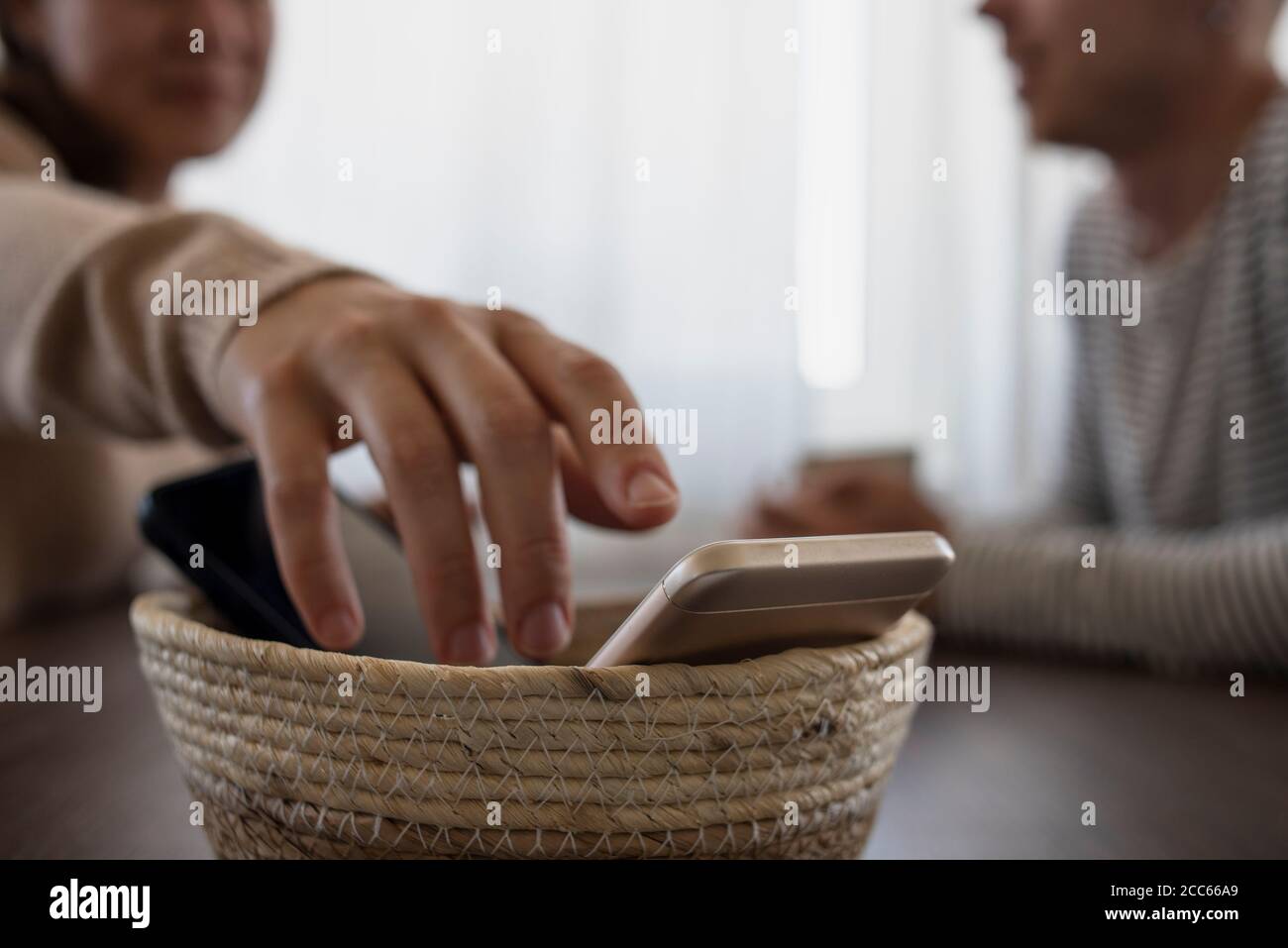 People on meeting without their phones. Digital detox concept. Turned ...