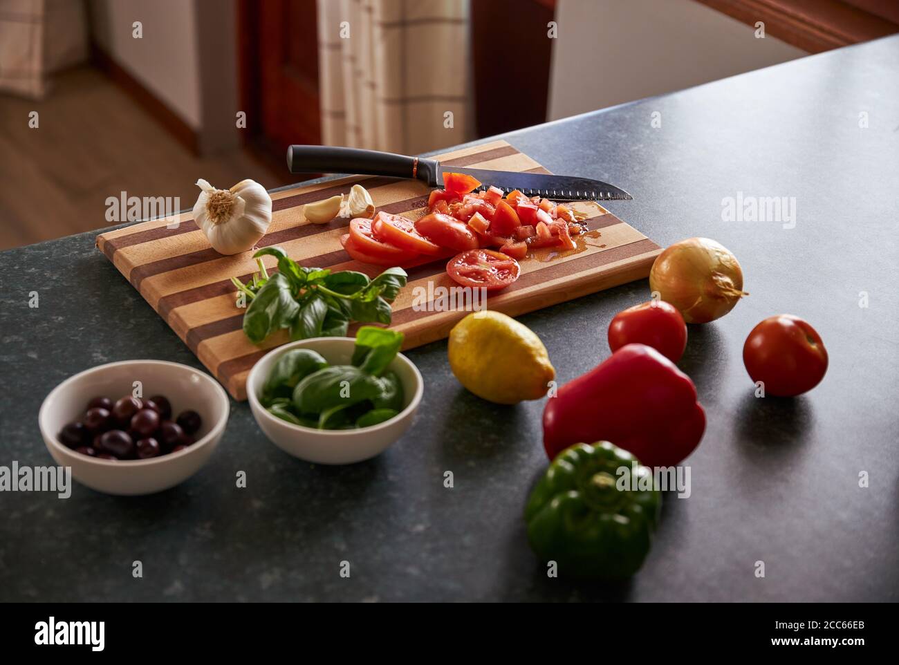 Vegetarian dinner recipe on chopping board in kitchen Stock Photo - Alamy