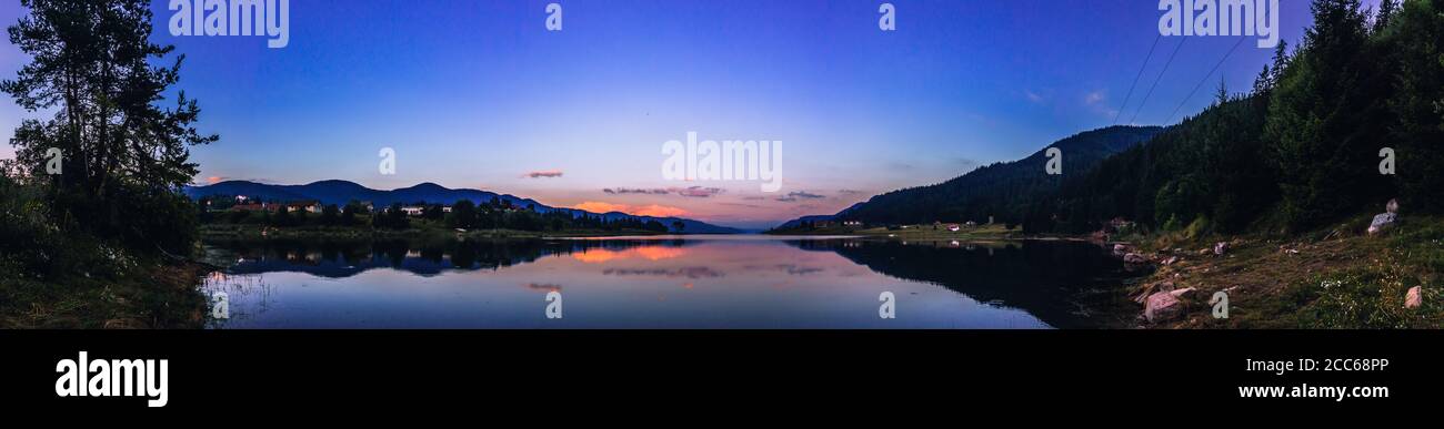 Sunset landscape panorama over Dospat dam in Rodopi mountain, Bulgaria ...